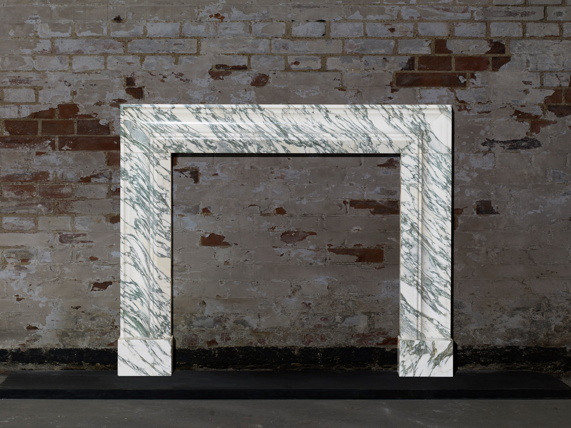 Bespoke marble bolection - Renaissance London
